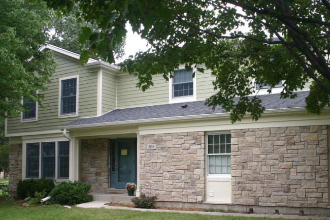 Exterior Stone and Hardie Board Sliding