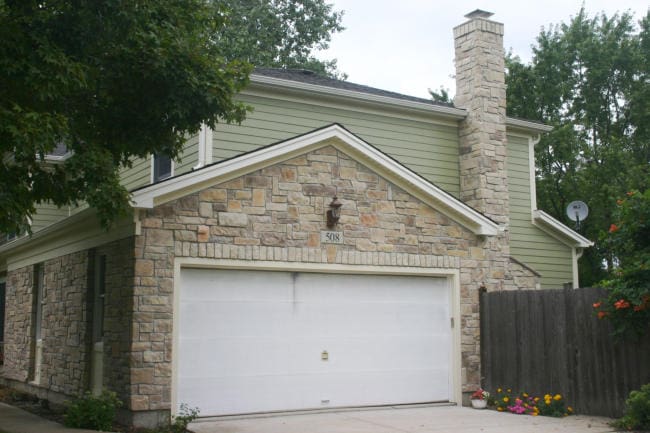 Exterior Stone and Hardie Board Sliding