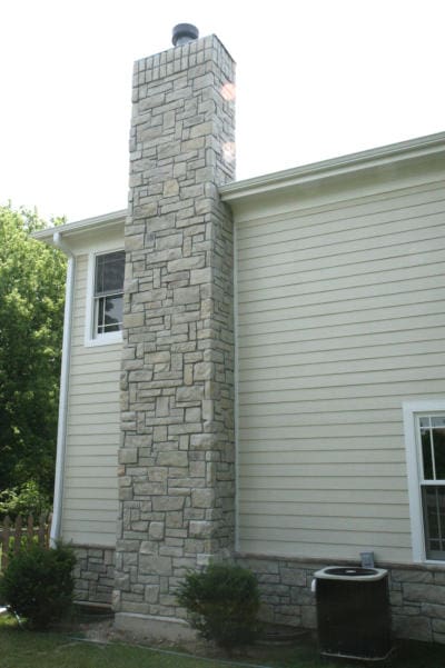 Exterior Stone and Hardie Board Sliding